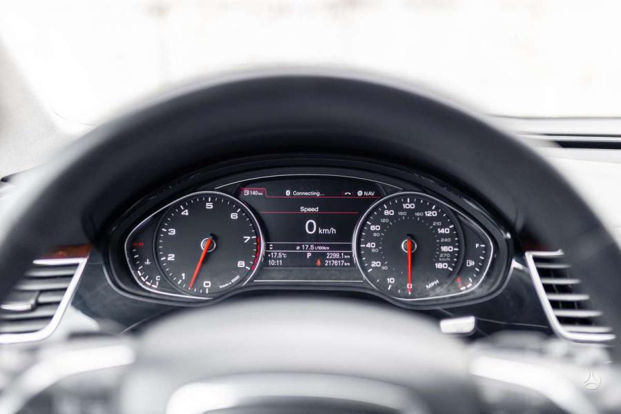 Black Audi A8 2012 in Vilnius, with an engine capacity of 4.16 L and mileage of 217 thousand km for 11500 €, photo 19 on AUTOMOTO.COM.LV