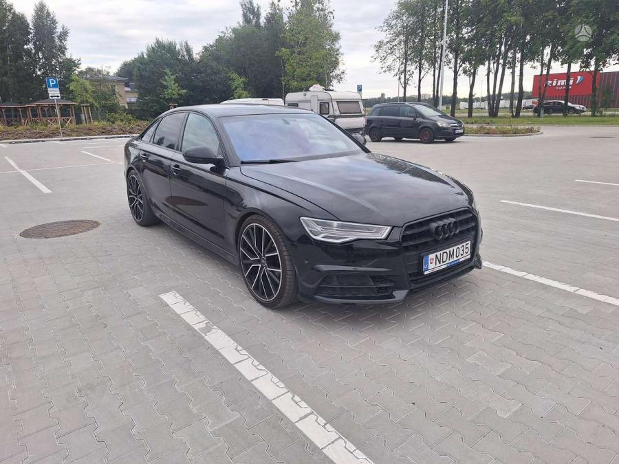 Black Audi A8 2012 in Vilnius, with an engine capacity of 2.97 L and mileage of 287 thousand km for 10900 €, photo 4 on AUTOMOTO.COM.LV