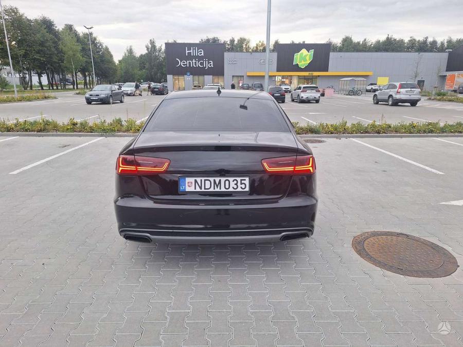 Black Audi A8 2012 in Vilnius, with an engine capacity of 2.97 L and mileage of 287 thousand km for 10900 €, photo 5 on AUTOMOTO.COM.LV