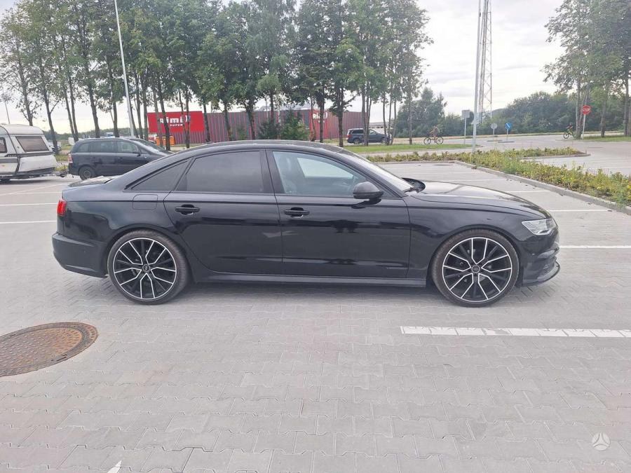 Black Audi A8 2012 in Vilnius, with an engine capacity of 2.97 L and mileage of 287 thousand km for 10900 €, photo 7 on AUTOMOTO.COM.LV