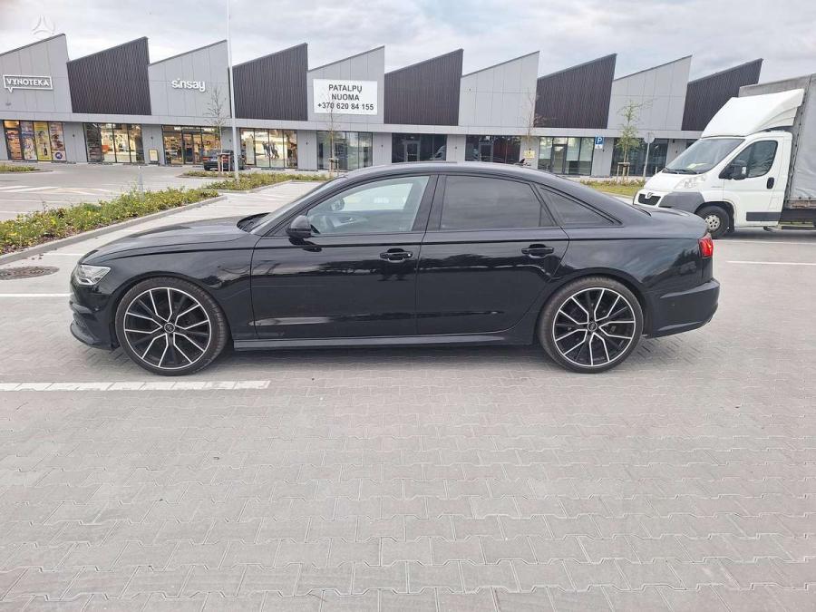 Black Audi A8 2012 in Vilnius, with an engine capacity of 2.97 L and mileage of 287 thousand km for 10900 €, photo 9 on AUTOMOTO.COM.LV