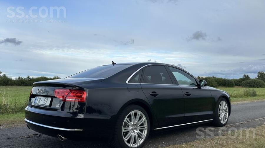 Black Audi A8 2012 in Ventspils, with an engine capacity of 3.00 L and mileage of 272 thousand km for 15500 €, photo 5 on AUTOMOTO.COM.LV