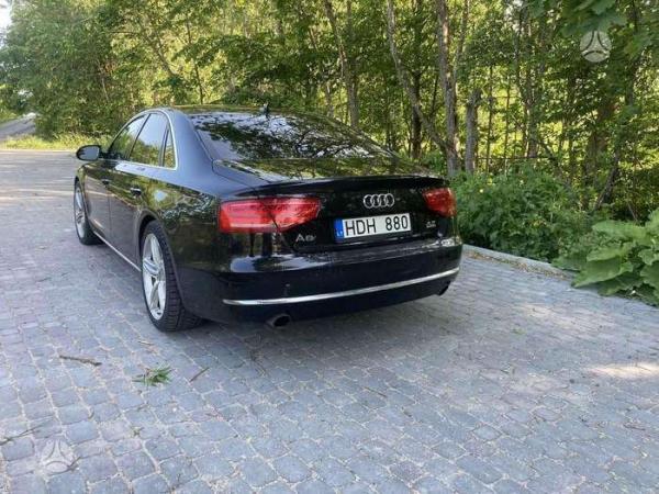 Black Audi A8 2012 in Klaipeda, with an engine capacity of 4.16 L and mileage of 235 thousand km for 9900 €, photo 4 on AUTOMOTO.COM.LV