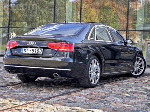 Black Audi A8 2012 in Riga, with an engine capacity of 3.00 L and mileage of 350 thousand km for 14900 €, photo 4 on AUTOMOTO.COM.LV