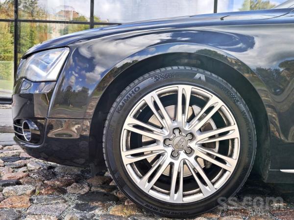 Black Audi A8 2012 in Riga, with an engine capacity of 3.00 L and mileage of 350 thousand km for 14900 €, photo 10 on AUTOMOTO.COM.LV
