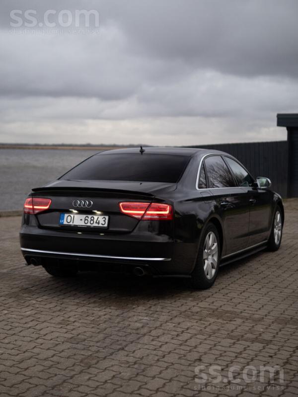 Black Audi A8 2013 in Liepaja, with an engine capacity of 4.20 L and mileage of 312 thousand km for 16000 €, photo 2 on AUTOMOTO.COM.LV