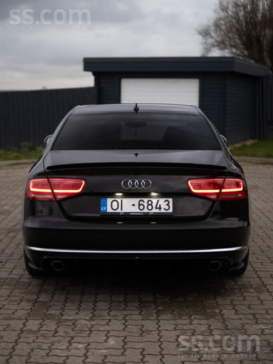 Black Audi A8 2013 in Liepaja, with an engine capacity of 4.20 L and mileage of 312 thousand km for 16000 €, photo 3 on AUTOMOTO.COM.LV