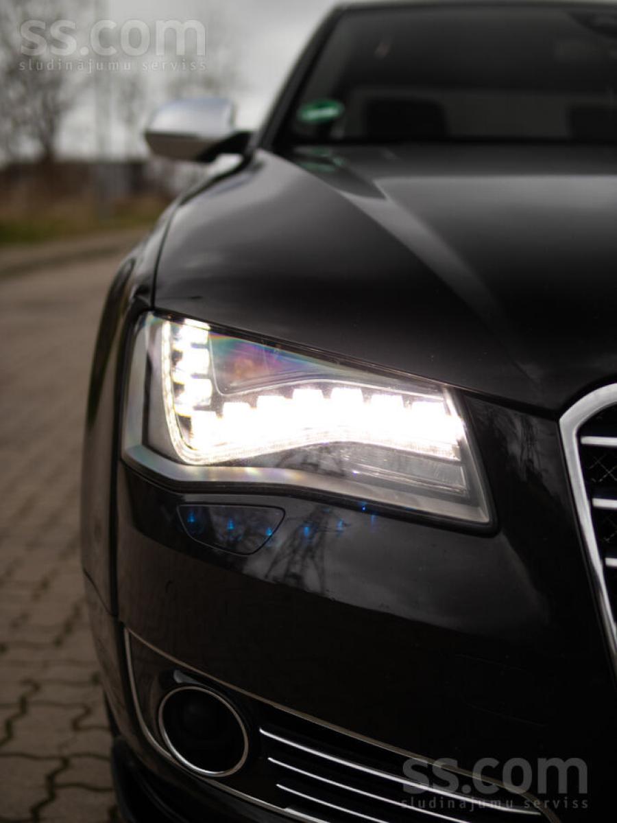 Black Audi A8 2013 in Liepaja, with an engine capacity of 4.20 L and mileage of 312 thousand km for 16000 €, photo 16 on AUTOMOTO.COM.LV