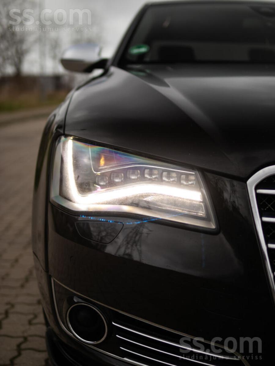 Black Audi A8 2013 in Liepaja, with an engine capacity of 4.20 L and mileage of 312 thousand km for 16000 €, photo 17 on AUTOMOTO.COM.LV