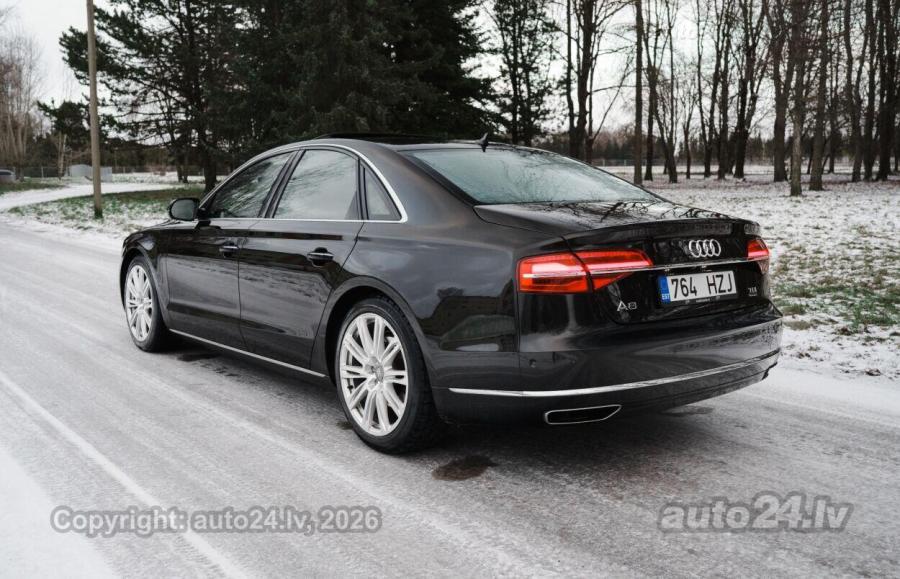 Black Audi A8 2013 in Tartu, with an engine capacity of 3.00 L and mileage of 290 thousand km for 18590 €, photo 4 on AUTOMOTO.COM.LV