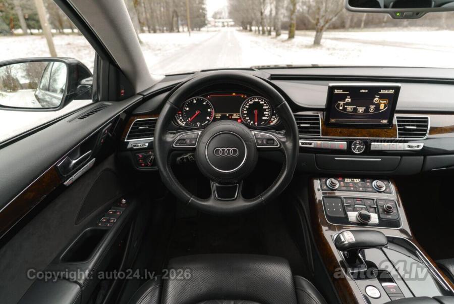Black Audi A8 2013 in Tartu, with an engine capacity of 3.00 L and mileage of 290 thousand km for 18590 €, photo 7 on AUTOMOTO.COM.LV