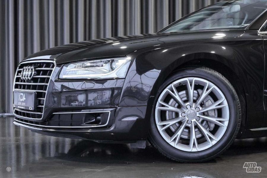 Black Audi A8 2013 in Marijampole, with an engine capacity of 3.00 L and mileage of 289 thousand km for 14950 €, photo 6 on AUTOMOTO.COM.LV