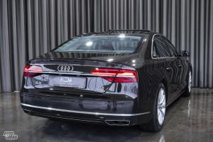 Black Audi A8 2013 in Marijampole, with an engine capacity of 3.00 L and mileage of 289 thousand km for 14950 €, photo 11 on AUTOMOTO.COM.LV