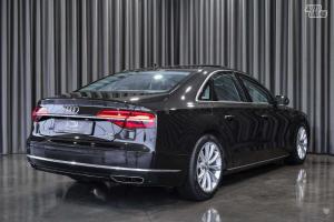 Black Audi A8 2013 in Marijampole, with an engine capacity of 3.00 L and mileage of 289 thousand km for 14950 €, photo 12 on AUTOMOTO.COM.LV