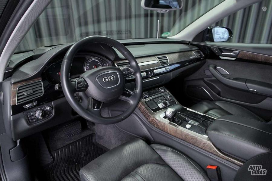 Black Audi A8 2013 in Marijampole, with an engine capacity of 3.00 L and mileage of 289 thousand km for 14950 €, photo 25 on AUTOMOTO.COM.LV