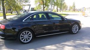 Black Audi A8 2013 in Taurage, with an engine capacity of 3.00 L and mileage of 271 thousand km for 11900 €, photo 13 on AUTOMOTO.COM.LV