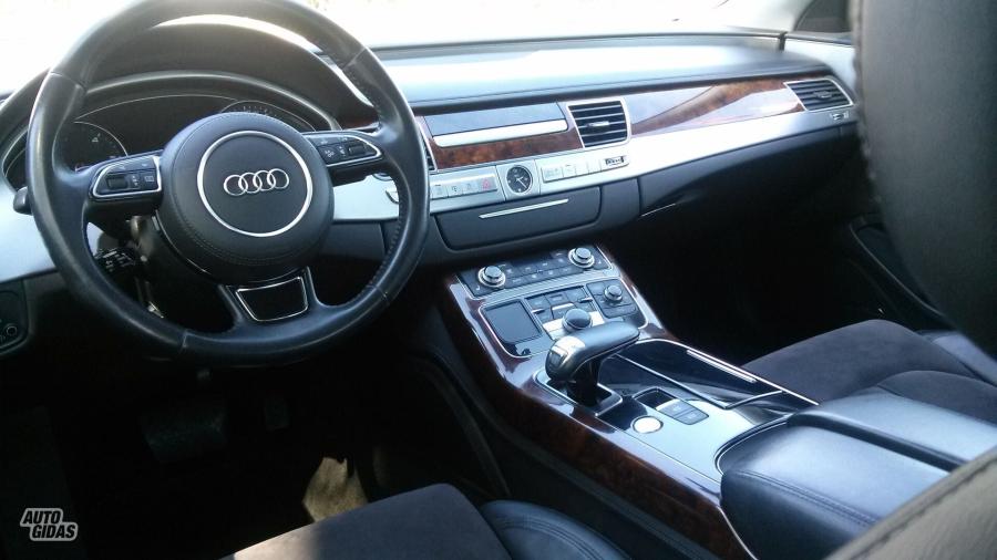 Black Audi A8 2013 in Taurage, with an engine capacity of 3.00 L and mileage of 271 thousand km for 11900 €, photo 18 on AUTOMOTO.COM.LV