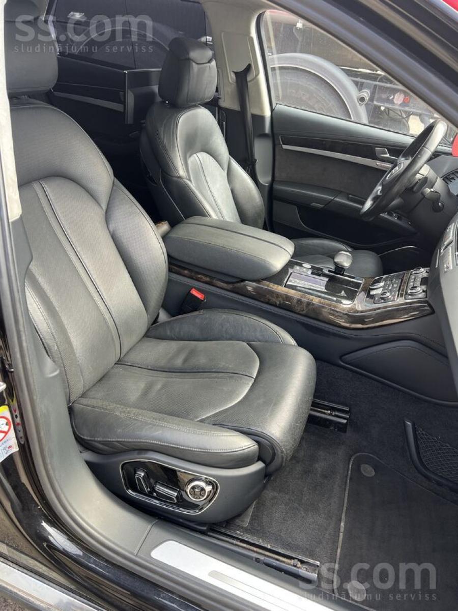 Black Audi A8 2013 in Riga, with an engine capacity of 3.00 L and mileage of 281 thousand km for 18000 €, photo 6 on AUTOMOTO.COM.LV