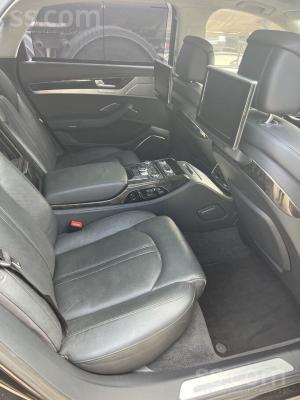 Black Audi A8 2013 in Riga, with an engine capacity of 3.00 L and mileage of 281 thousand km for 18000 €, photo 7 on AUTOMOTO.COM.LV