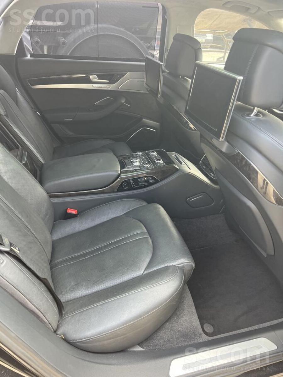 Black Audi A8 2013 in Riga, with an engine capacity of 3.00 L and mileage of 281 thousand km for 18000 €, photo 7 on AUTOMOTO.COM.LV