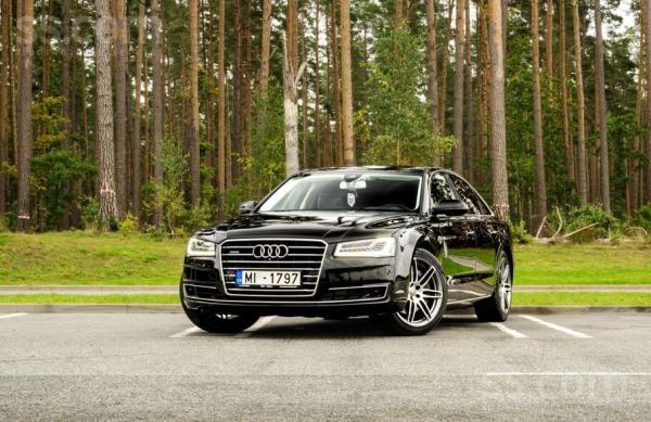 Black Audi A8 2014 in Riga, with an engine capacity of 3.00 L and mileage of 333 thousand km for 18190 €, photo 1 on AUTOMOTO.COM.LV