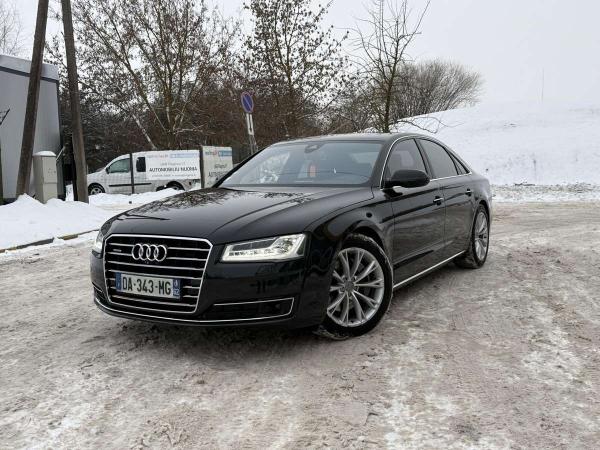 Black Audi A8 2014 in Panevezys, with an engine capacity of 2.97 L and mileage of 248 thousand km for 18590 €, photo 1 on AUTOMOTO.COM.LV