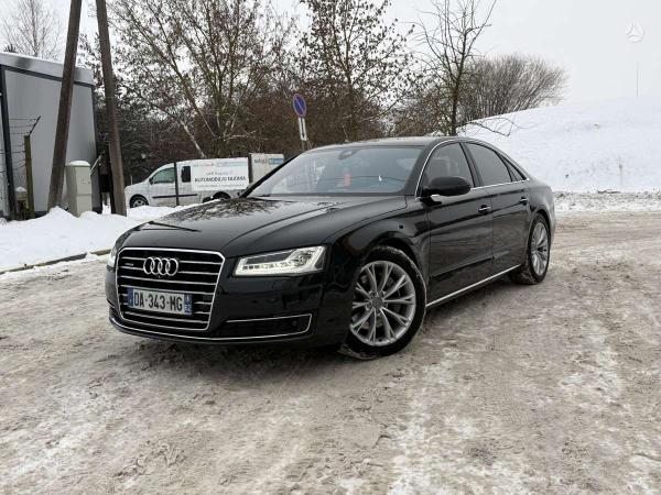 Black Audi A8 2014 in Panevezys, with an engine capacity of 2.97 L and mileage of 248 thousand km for 18590 €, photo 4 on AUTOMOTO.COM.LV