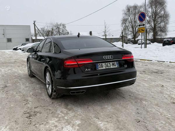 Black Audi A8 2014 in Panevezys, with an engine capacity of 2.97 L and mileage of 248 thousand km for 18590 €, photo 6 on AUTOMOTO.COM.LV