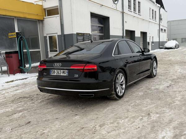 Black Audi A8 2014 in Panevezys, with an engine capacity of 2.97 L and mileage of 248 thousand km for 18590 €, photo 7 on AUTOMOTO.COM.LV