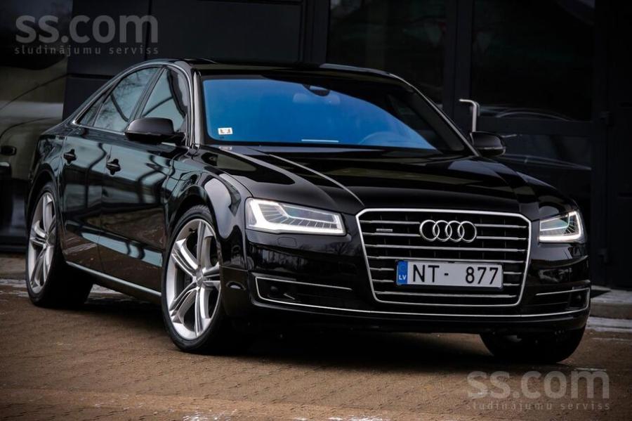 Black Audi A8 2014 in Riga, with an engine capacity of 4.20 L and mileage of 202 thousand km for 25000 €, photo 4 on AUTOMOTO.COM.LV