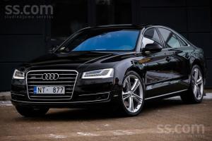Black Audi A8 2014 in Riga, with an engine capacity of 4.20 L and mileage of 202 thousand km for 25000 €, photo 5 on AUTOMOTO.COM.LV