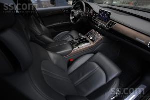 Black Audi A8 2014 in Riga, with an engine capacity of 4.20 L and mileage of 202 thousand km for 25000 €, photo 12 on AUTOMOTO.COM.LV