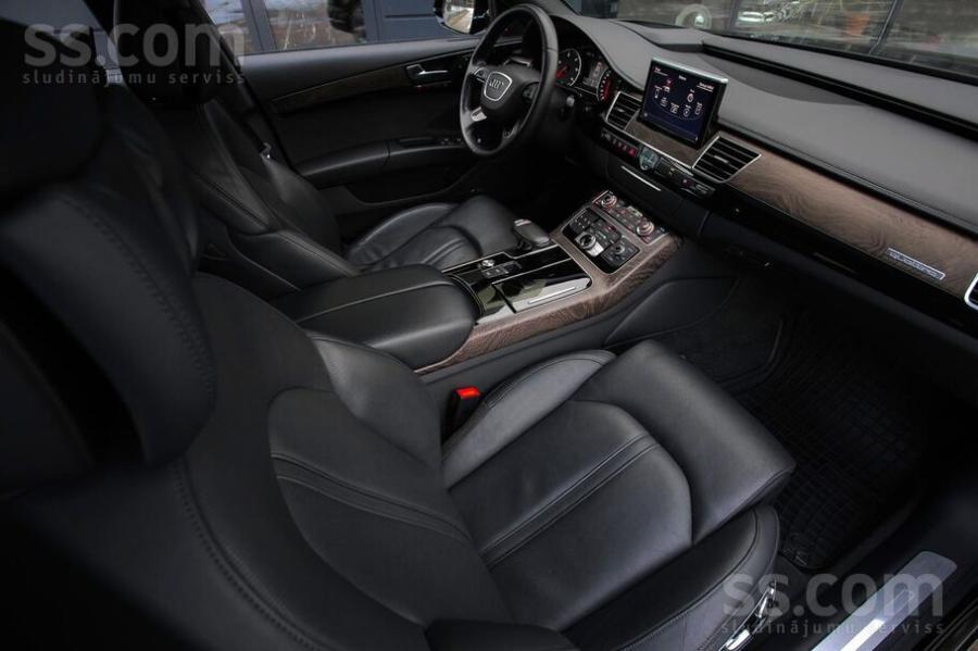 Black Audi A8 2014 in Riga, with an engine capacity of 4.20 L and mileage of 202 thousand km for 25000 €, photo 12 on AUTOMOTO.COM.LV