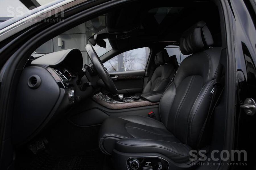 Black Audi A8 2014 in Riga, with an engine capacity of 4.20 L and mileage of 202 thousand km for 25000 €, photo 13 on AUTOMOTO.COM.LV