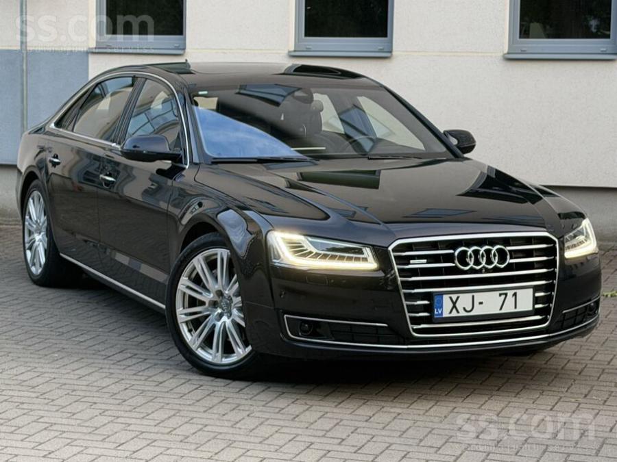 Black Audi A8 2014 in Jurmala, with an engine capacity of 3.00 L and mileage of 228 thousand km for 23800 €, photo 3 on AUTOMOTO.COM.LV