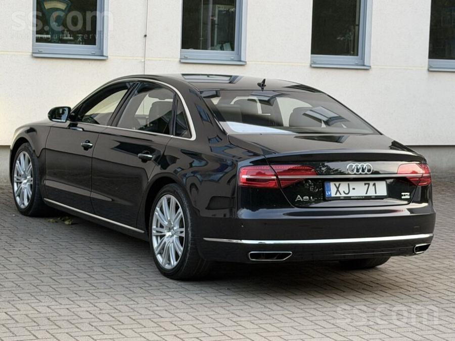 Black Audi A8 2014 in Jurmala, with an engine capacity of 3.00 L and mileage of 228 thousand km for 23800 €, photo 4 on AUTOMOTO.COM.LV