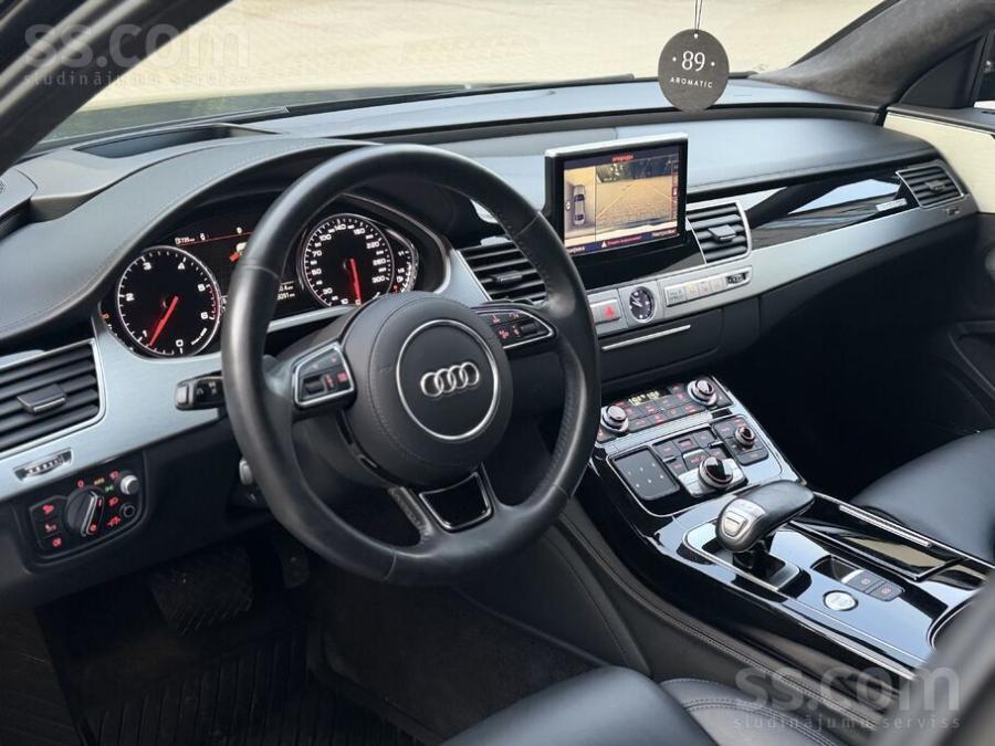 Black Audi A8 2014 in Jurmala, with an engine capacity of 3.00 L and mileage of 228 thousand km for 23800 €, photo 19 on AUTOMOTO.COM.LV