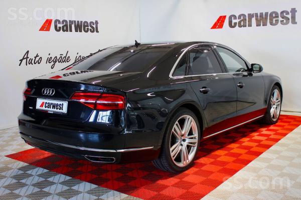 Black Audi A8 2014 in Riga, with an engine capacity of 3.00 L and mileage of 262 thousand km for 17500 €, photo 4 on AUTOMOTO.COM.LV