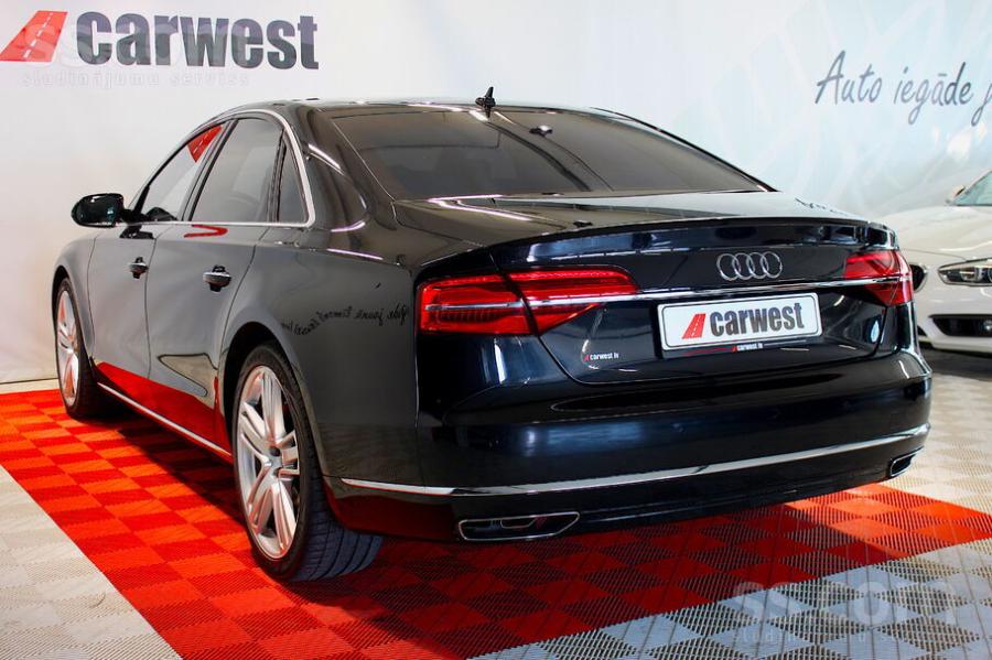 Black Audi A8 2014 in Riga, with an engine capacity of 3.00 L and mileage of 262 thousand km for 17500 €, photo 7 on AUTOMOTO.COM.LV