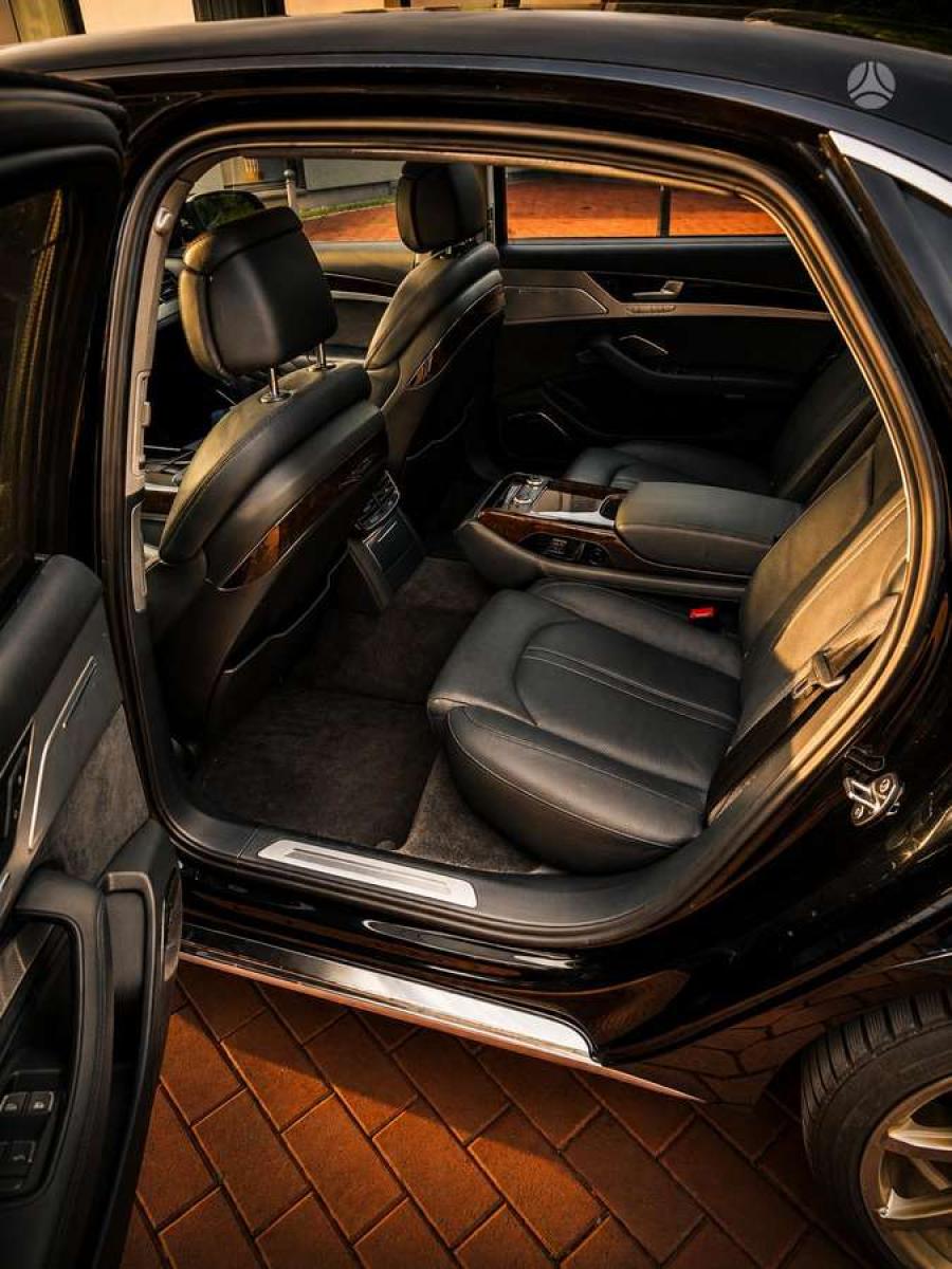 Black Audi A8 2014 in Vilnius, with an engine capacity of 3.99 L and mileage of 152 thousand km for 21000 €, photo 15 on AUTOMOTO.COM.LV