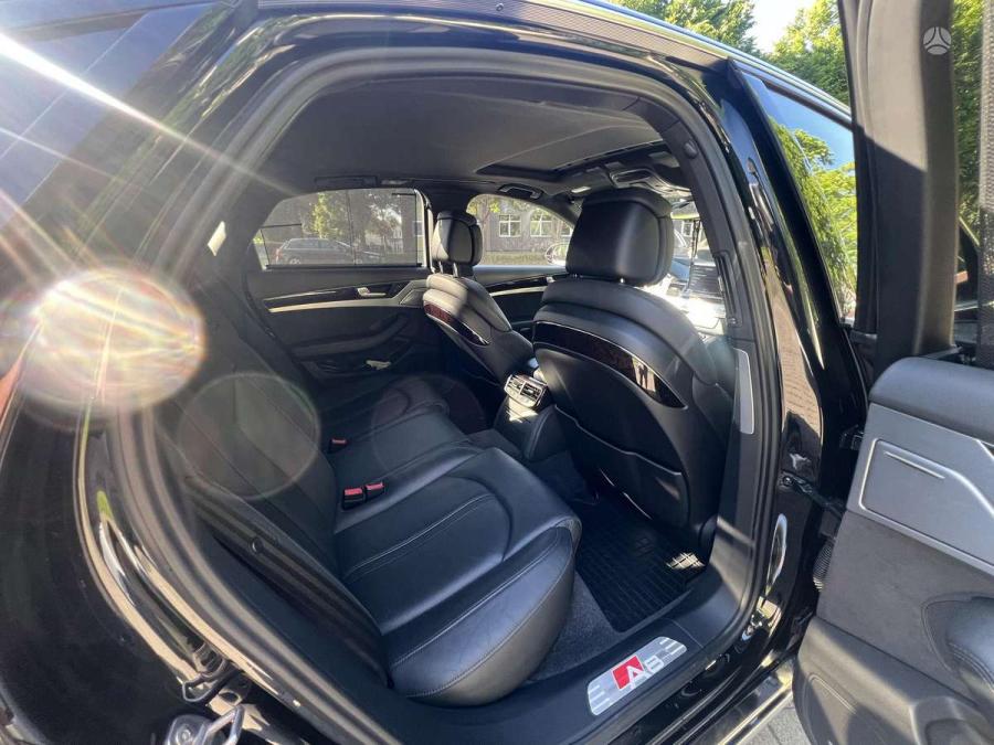 Melns Audi A8 2014 Jonava, ar dzinēja tilpumu 3.00 L un nobraukumu 283 tūkst. km par 24000 €, foto 23 vietnē AUTOMOTO.COM.LV