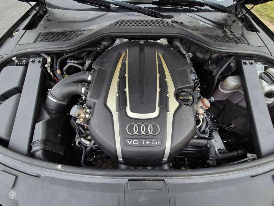 Black Audi A8 2015 in Vilnius, with an engine capacity of 3.99 L and mileage of 266 thousand km for 12700 €, photo 38 on AUTOMOTO.COM.LV