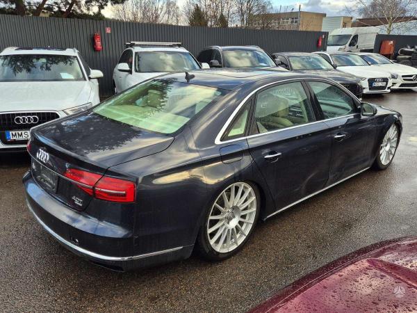 Black Audi A8 2015 in Vilnius, with an engine capacity of 3.99 L and mileage of 204 thousand km for 9900 €, photo 1 on AUTOMOTO.COM.LV