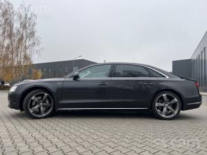 Black Audi A8 2015 in Riga, with an engine capacity of 4.20 L and mileage of 108 thousand km for 24900 €, photo 4 on AUTOMOTO.COM.LV