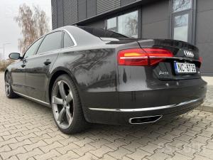 Black Audi A8 2015 in Riga, with an engine capacity of 4.20 L and mileage of 108 thousand km for 24900 €, photo 20 on AUTOMOTO.COM.LV