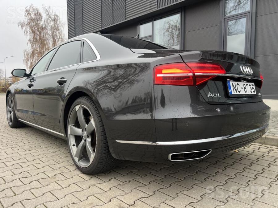 Black Audi A8 2015 in Riga, with an engine capacity of 4.20 L and mileage of 108 thousand km for 24900 €, photo 20 on AUTOMOTO.COM.LV