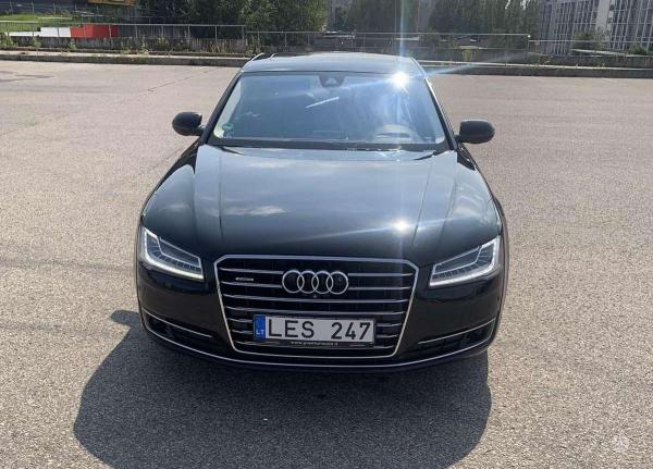 Black Audi A8 2015 in Vilnius, with an engine capacity of 2.97 L and mileage of 138 thousand km for 24999 €, photo 1 on AUTOMOTO.COM.LV