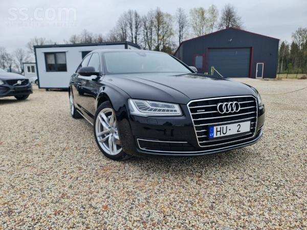 Black Audi A8 2015 in Cesis, with an engine capacity of 3.00 L and mileage of 195 thousand km for 21900 €, photo 1 on AUTOMOTO.COM.LV