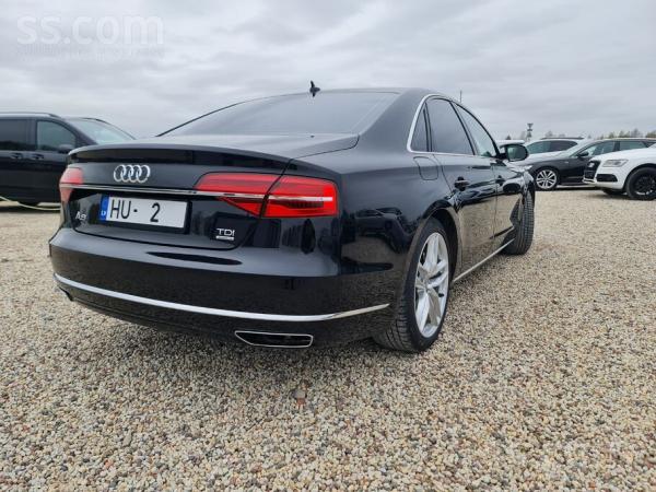 Black Audi A8 2015 in Cesis, with an engine capacity of 3.00 L and mileage of 195 thousand km for 21900 €, photo 3 on AUTOMOTO.COM.LV