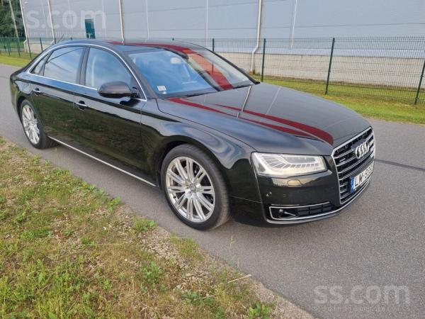 Black Audi A8 2015 in Riga, with an engine capacity of 3.00 L and mileage of 176 thousand km for 24500 €, photo 2 on AUTOMOTO.COM.LV